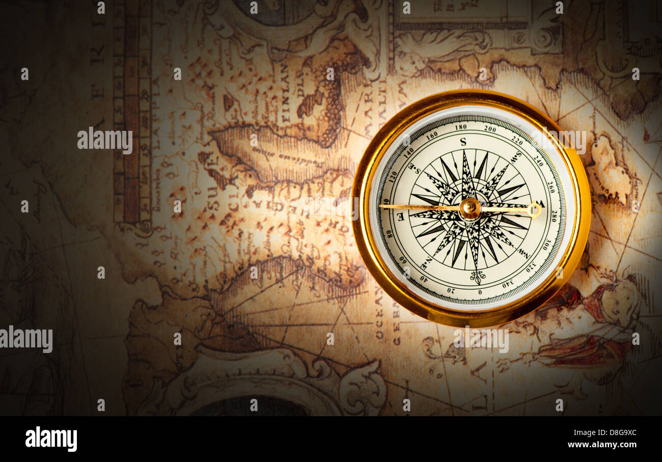 Old compass on ancient map Stock Photo - Alamy