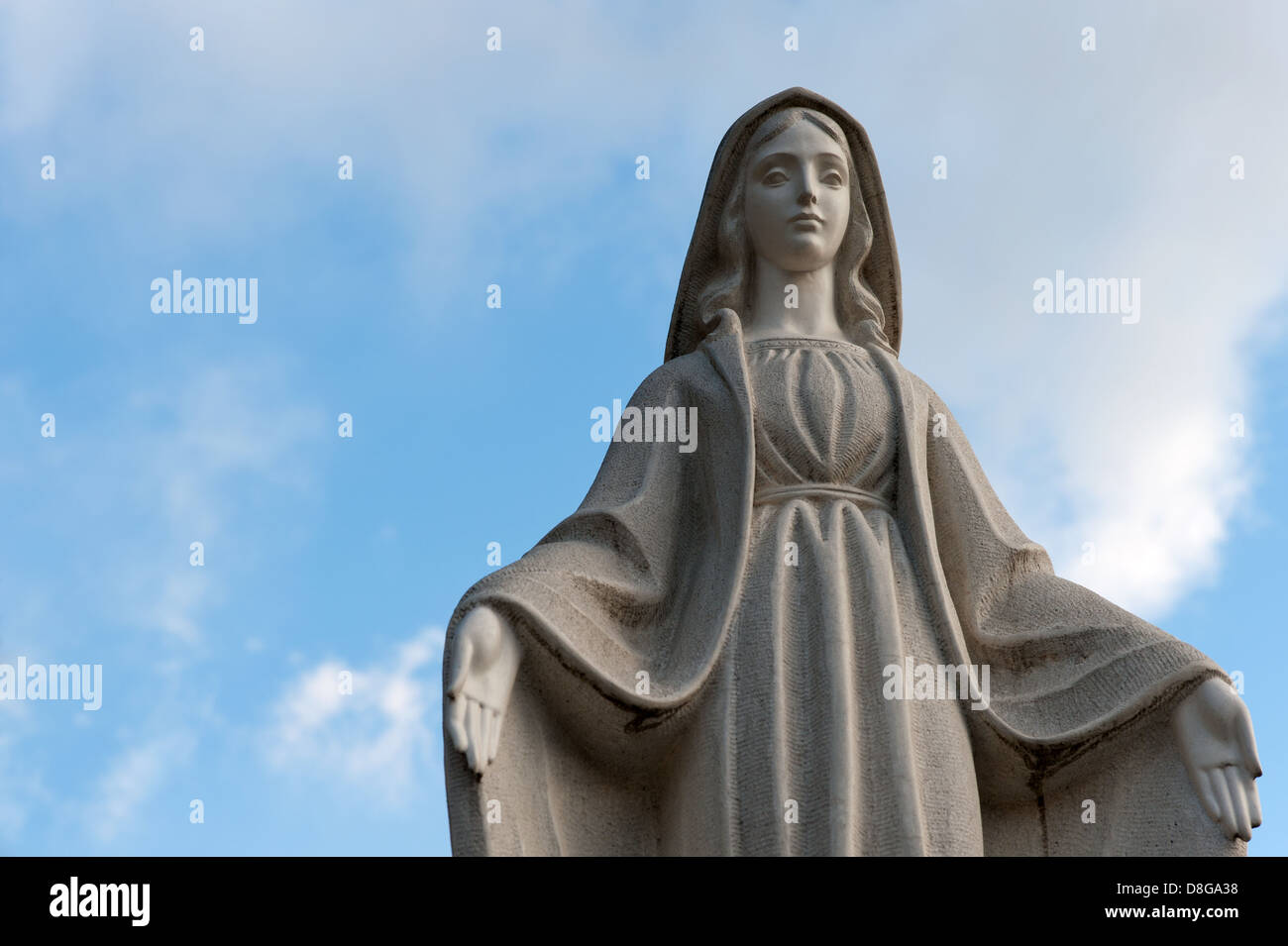 Monument Lady of Guadalupe on a cemetery Stock Photo - Alamy