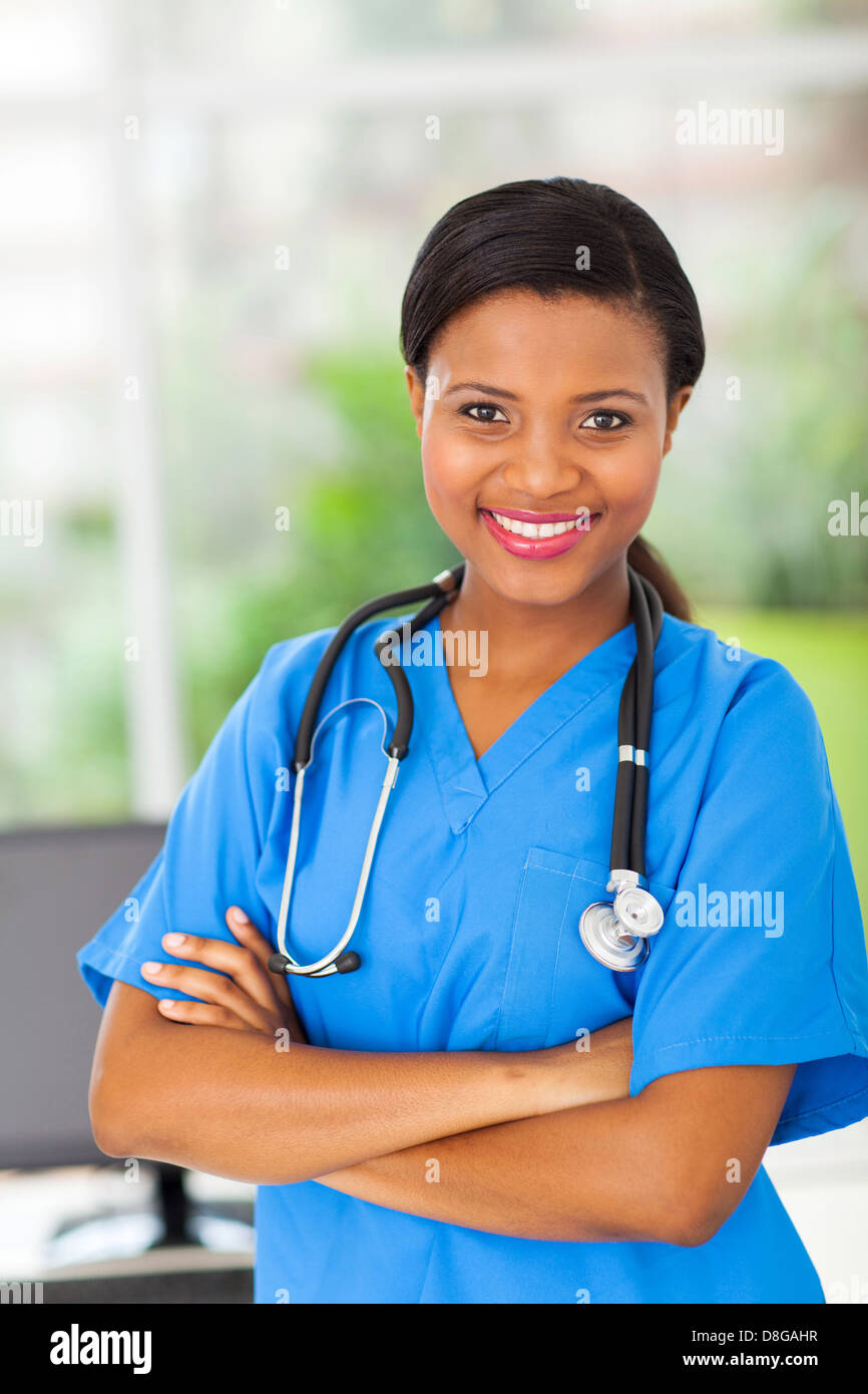 portrait of beautiful afro American female medical intern in modern ...