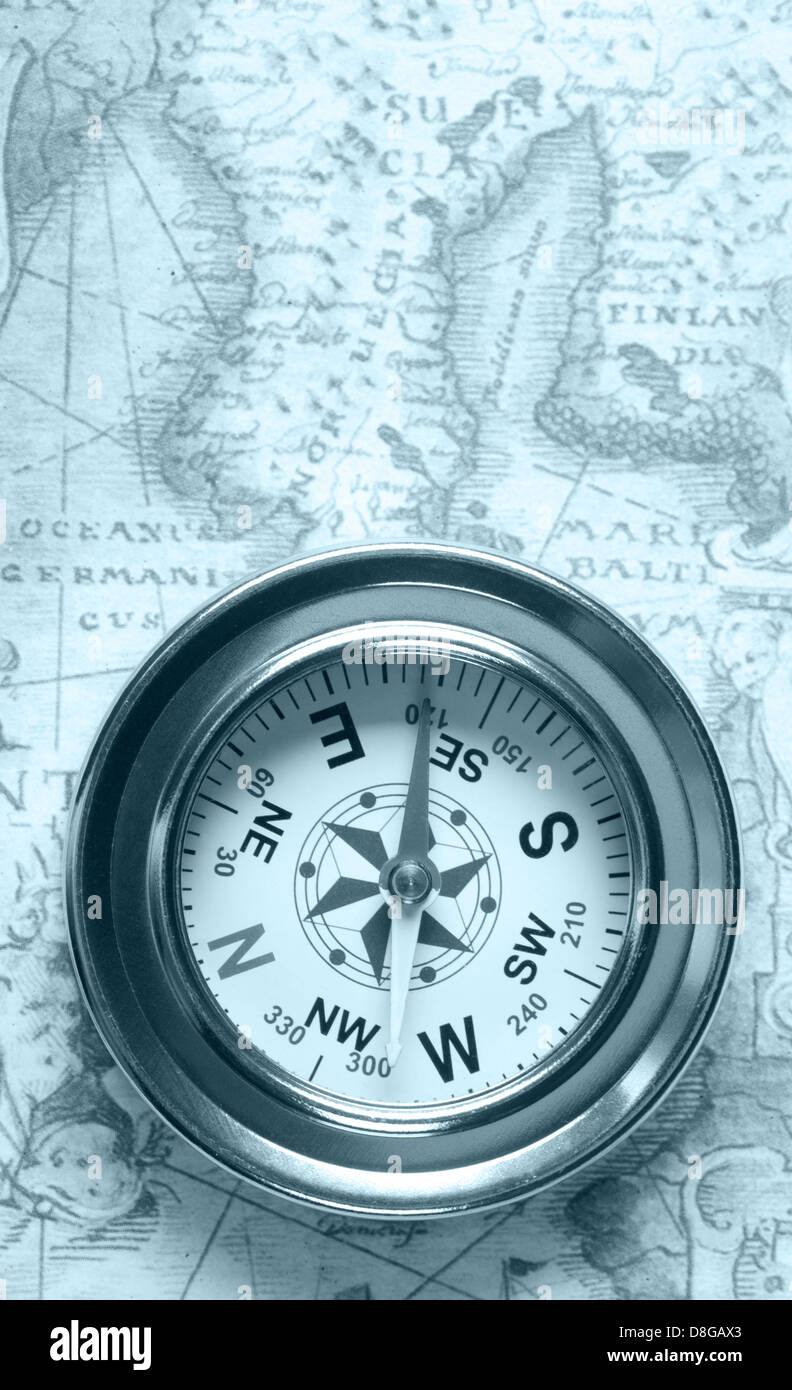 Old compass on ancient map Stock Photo - Alamy