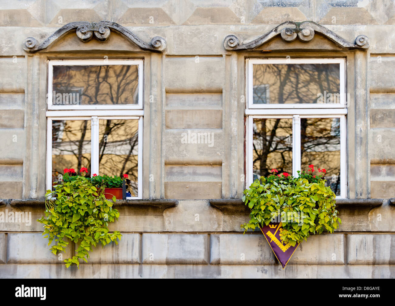 Facade of a building with windows Stock Photo - Alamy