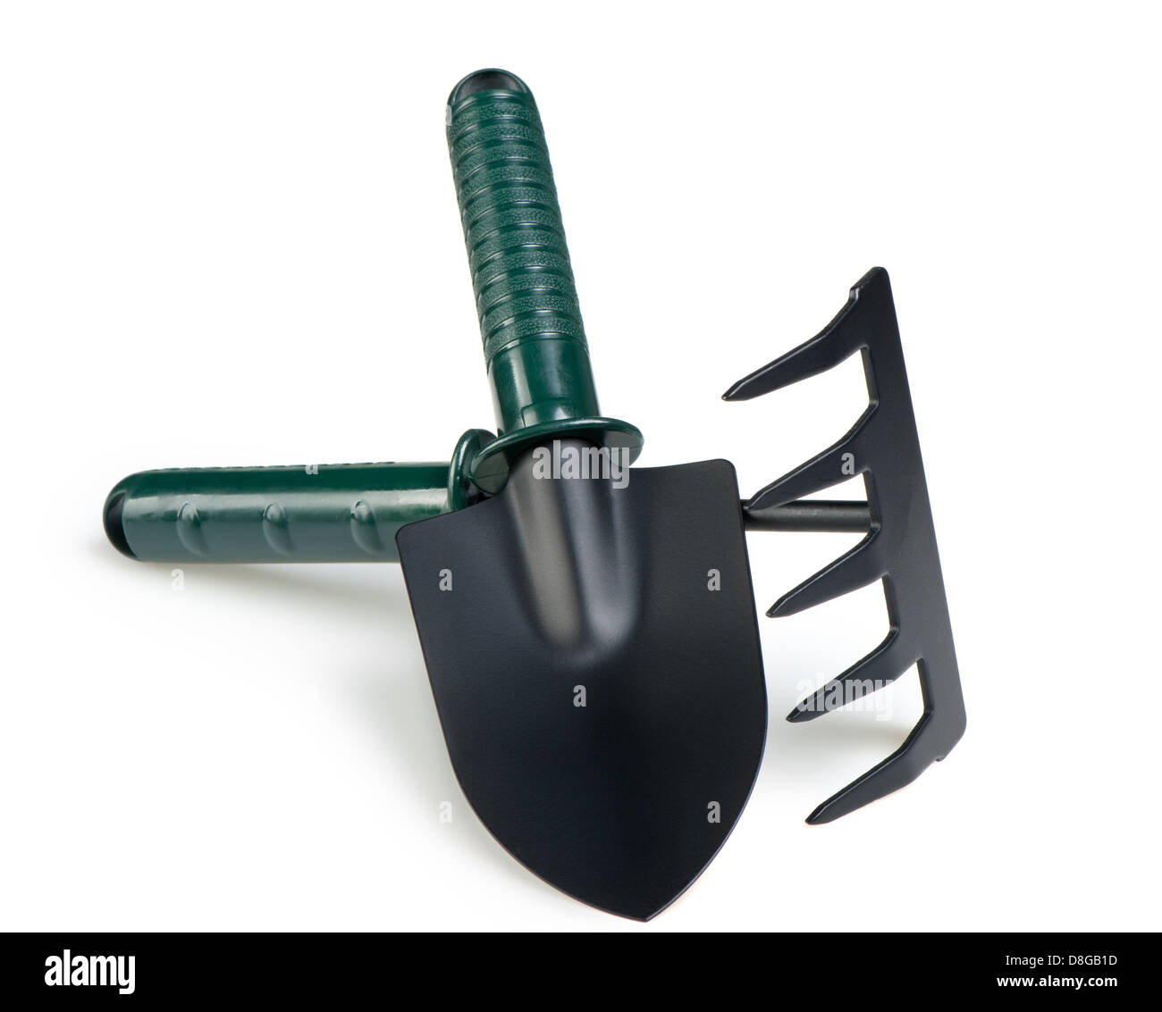 The garden tool a shovel, a rake Stock Photo - Alamy