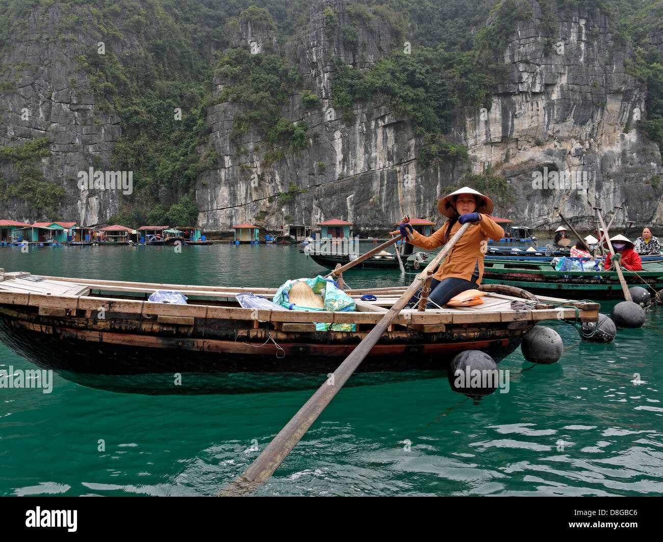 Boats waiting for tourists visiting the Vung Vieng floating village ...
