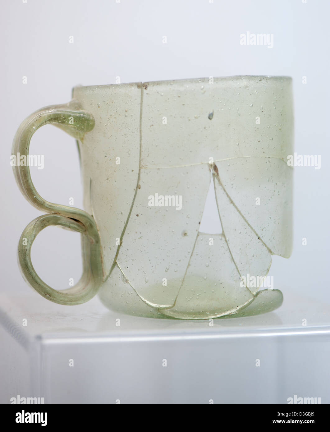 The old broken glass cup Stock Photo - Alamy