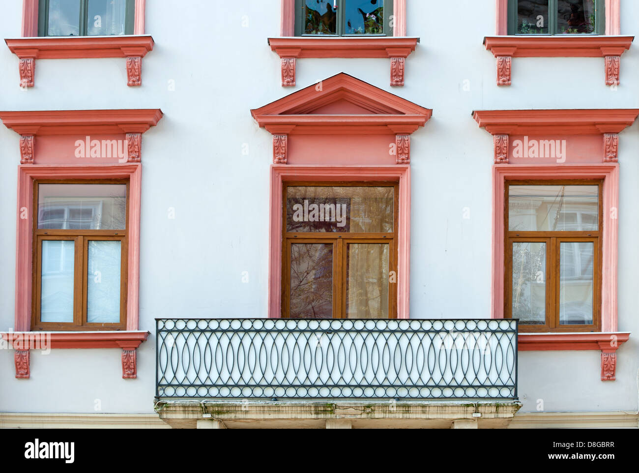 Facade of a building with a balcony Stock Photo - Alamy