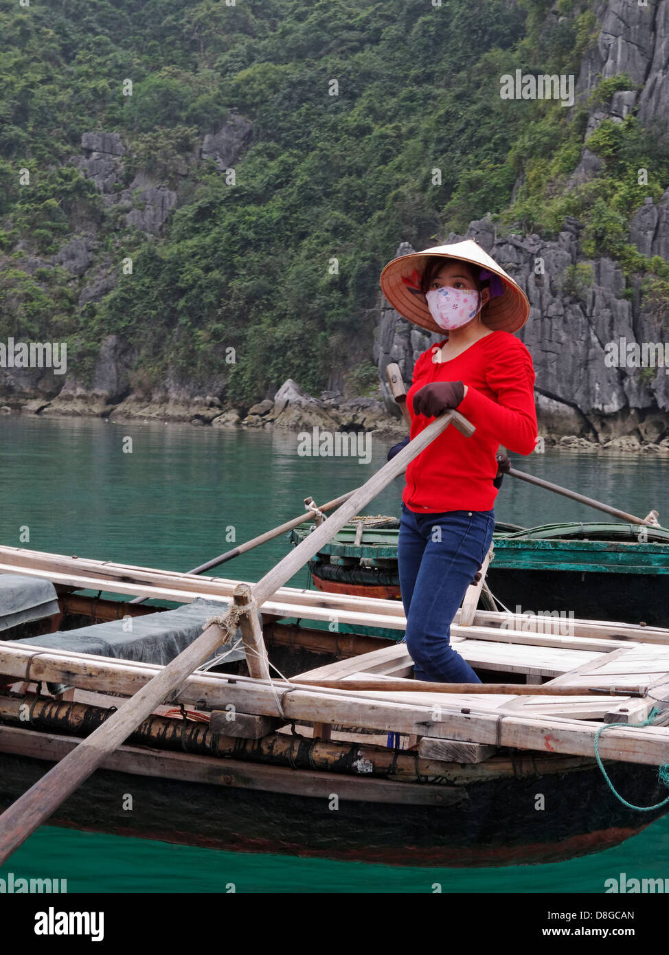 Boat lady waiting for tourists visiting the Vung Vieng floating village ...