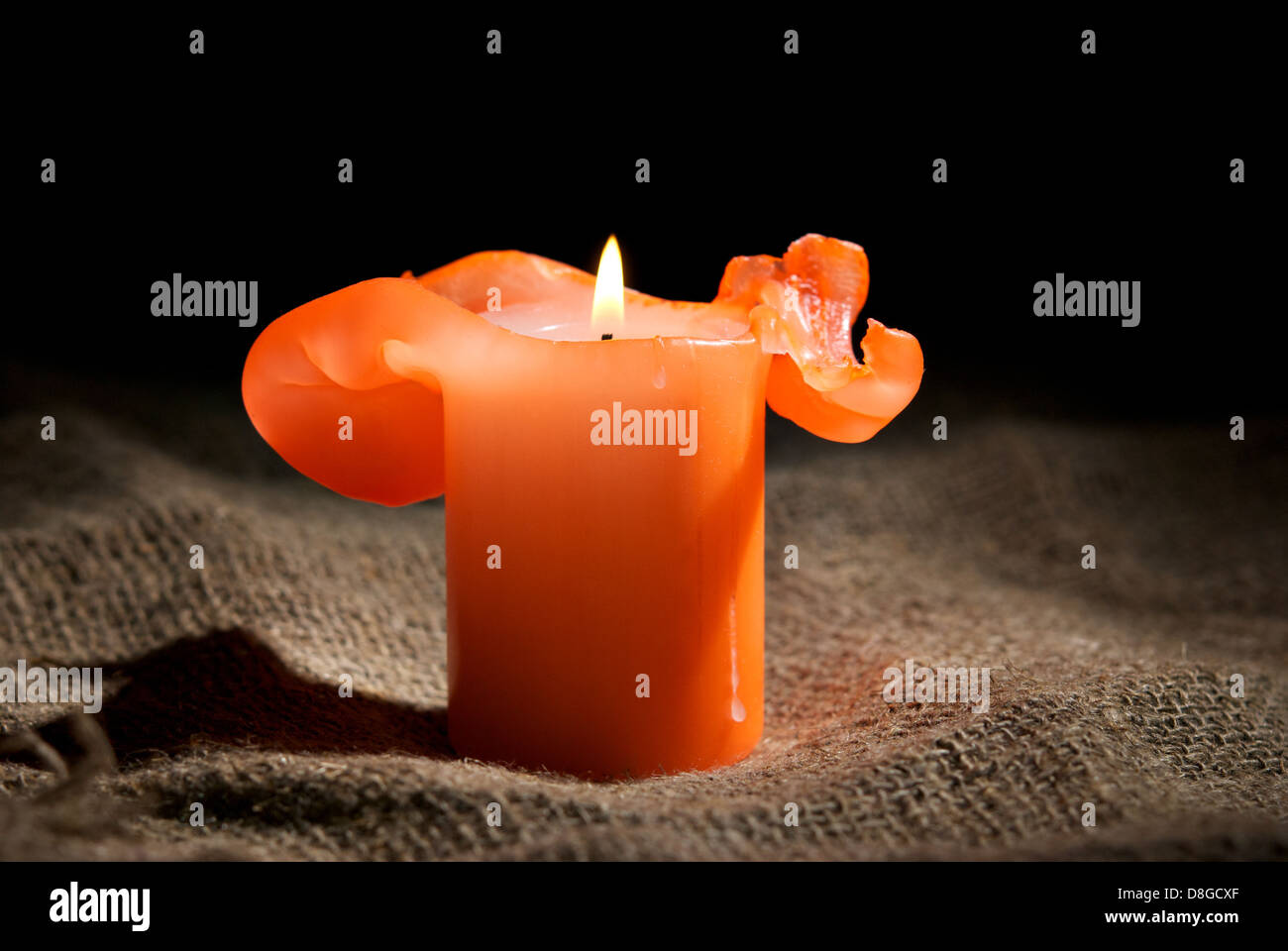 Closeup of a burning candle Stock Photo - Alamy