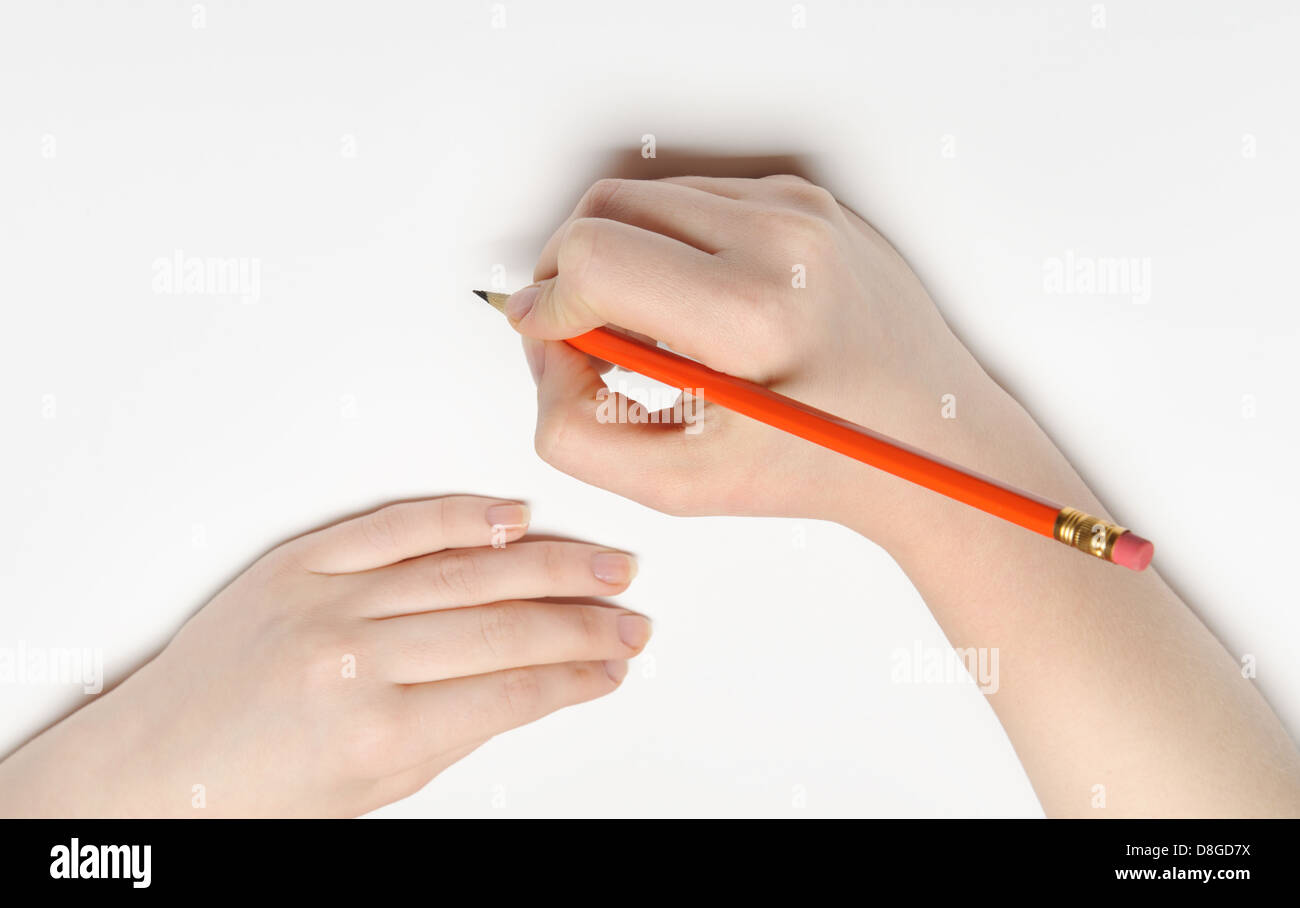 Hand with red pencil Stock Photo - Alamy