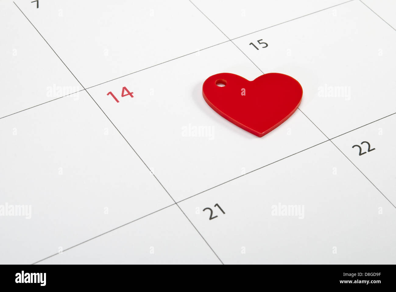 Red heart sign on calendar page Stock Photo - Alamy
