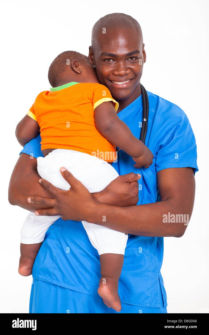 portrait of African American male pediatric doctor carrying a child ...