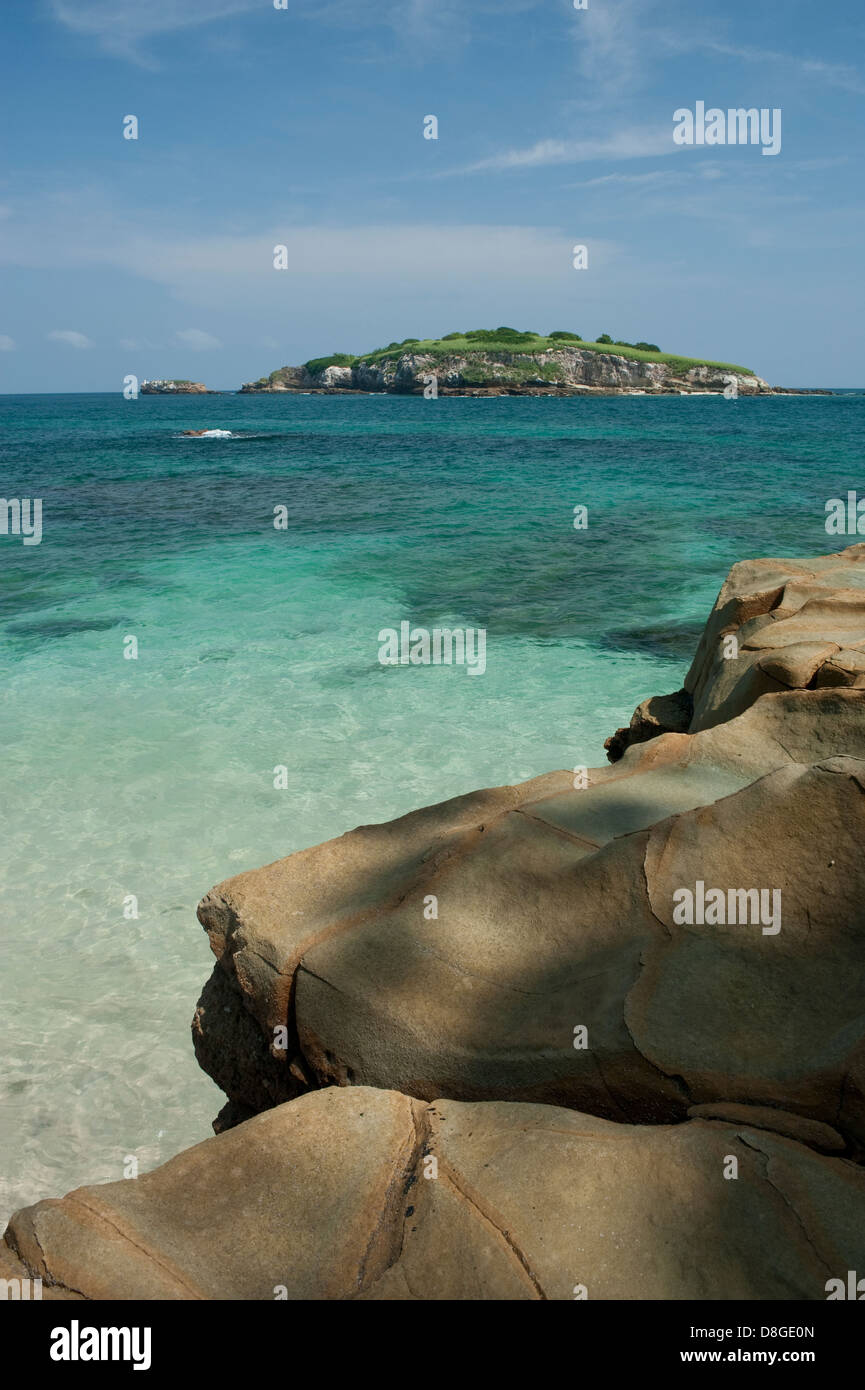 Rocky shore with clear waters, Pacheca island Stock Photo - Alamy