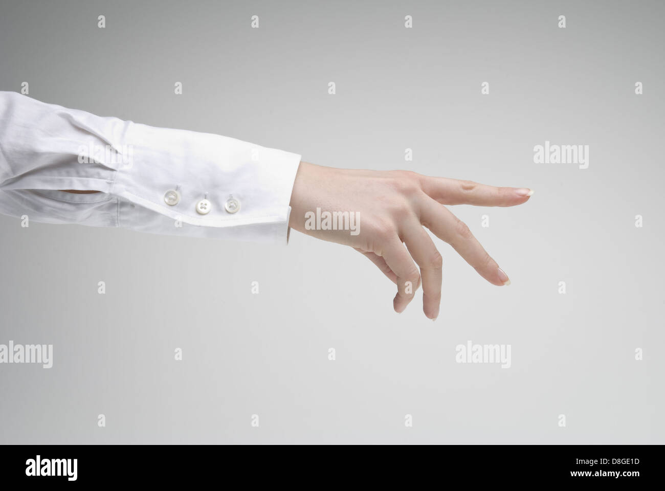 Woman extends a hand Stock Photo - Alamy