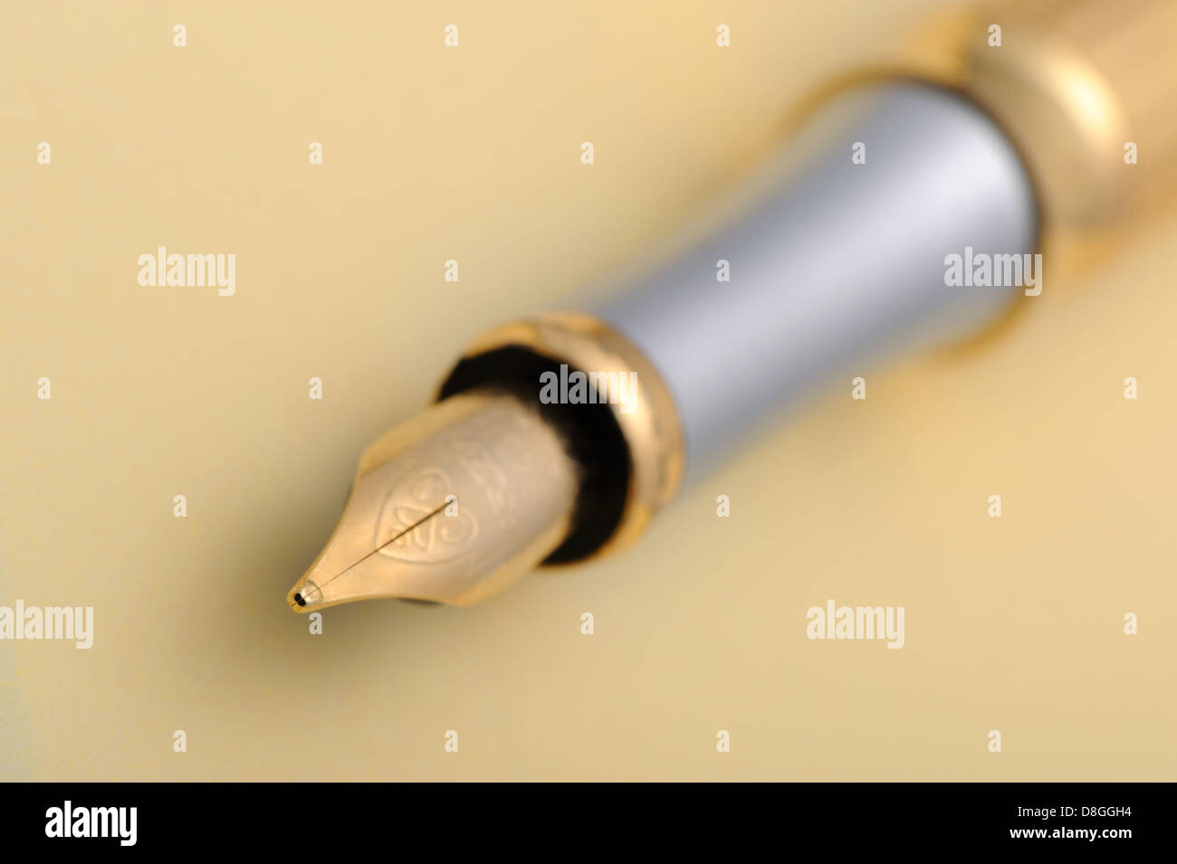 Gold fountain pen closeup Stock Photo - Alamy