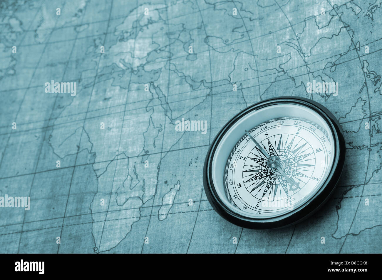 Compass on old map Stock Photo - Alamy