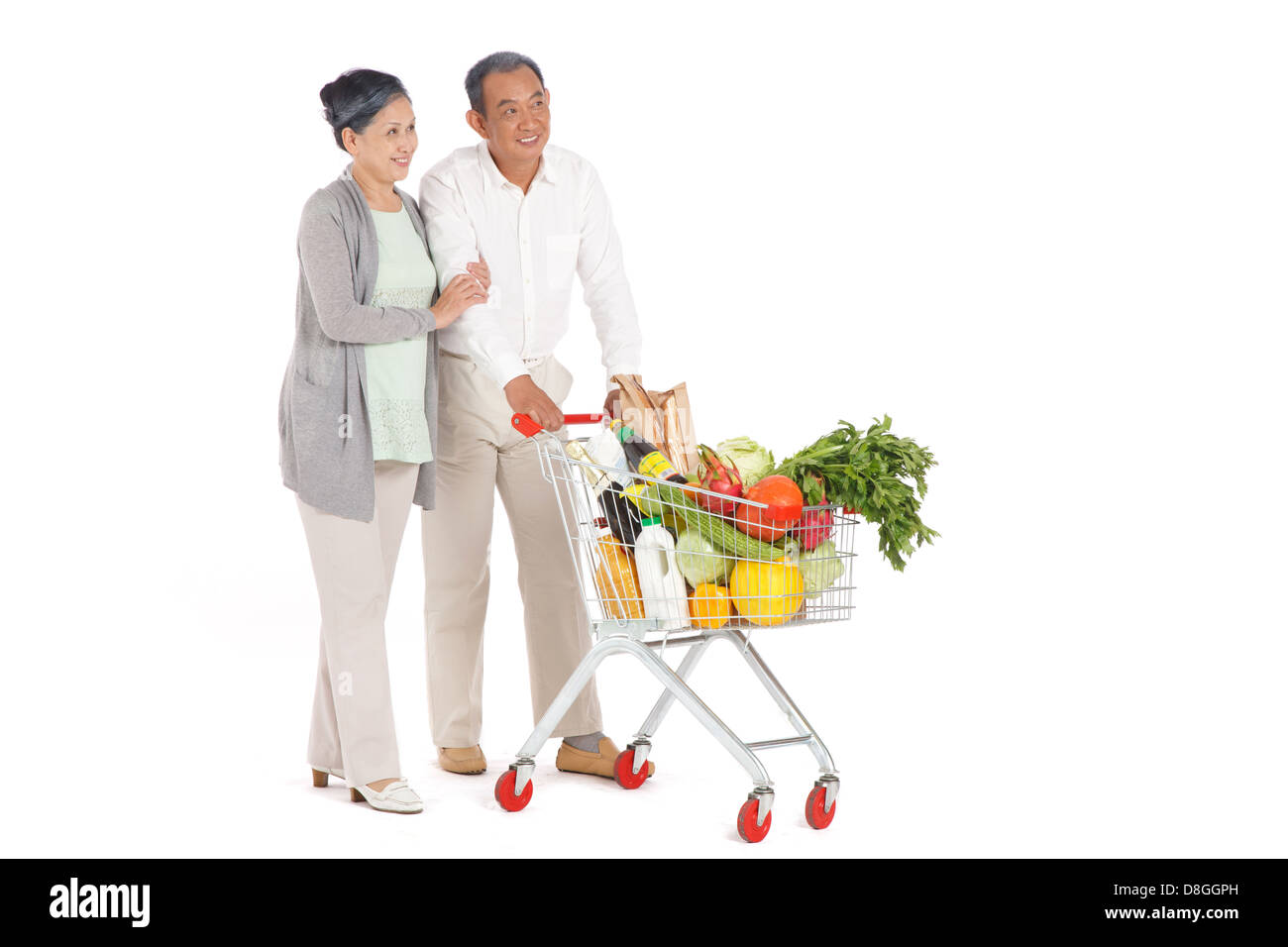 Woman shopping in old Cut Out Stock Images & Pictures - Alamy