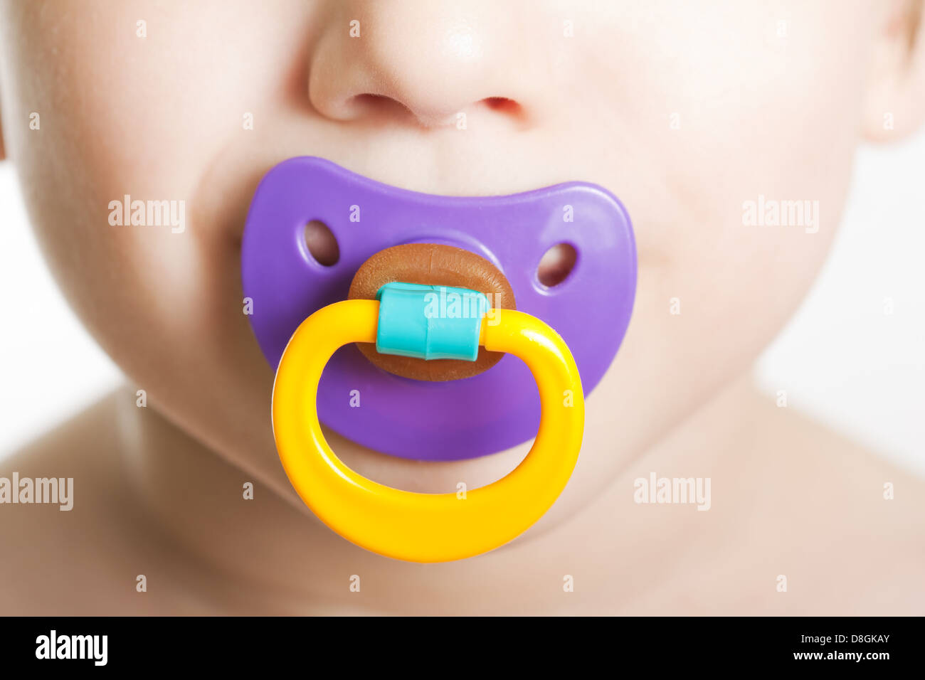 Child with baby pacifier Stock Photo - Alamy