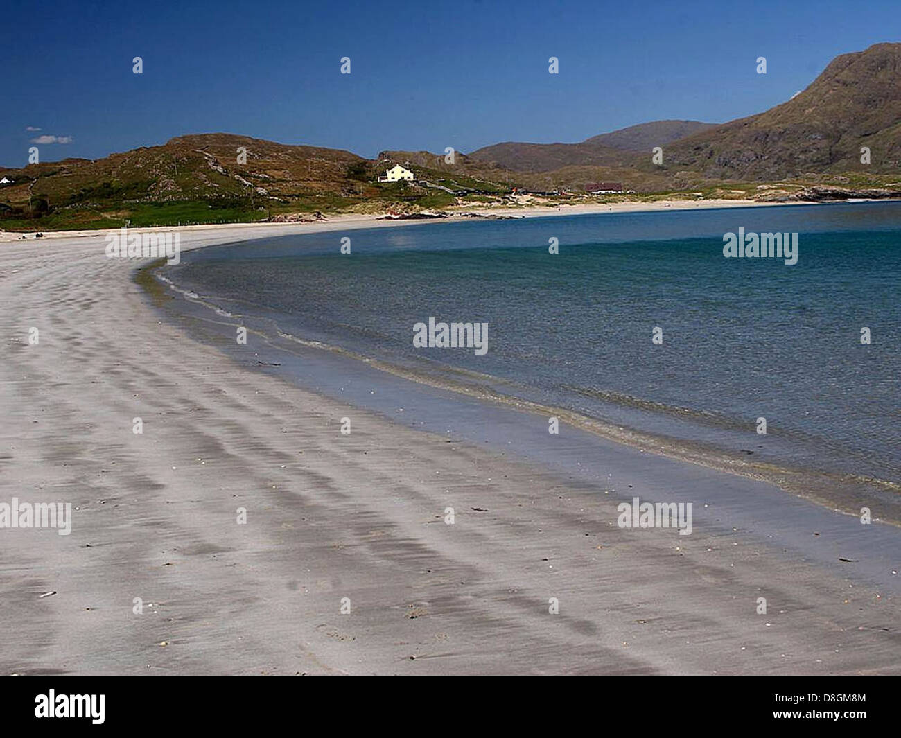 A scenic beach in Ireland, featuring a mix of sandy shores and rugged ...