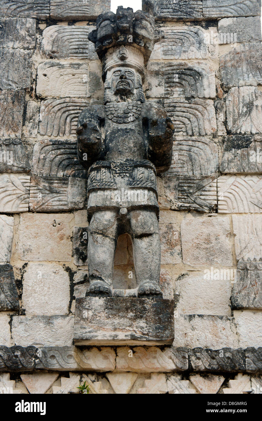 Mayan dignitary or ruler sculpture at the Mayan ruins of Kabah, Yucatan ...