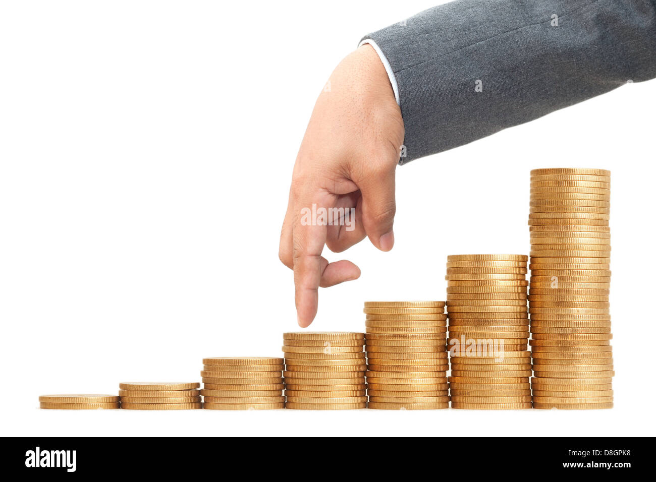 Hand going down staircase of coins Stock Photo - Alamy