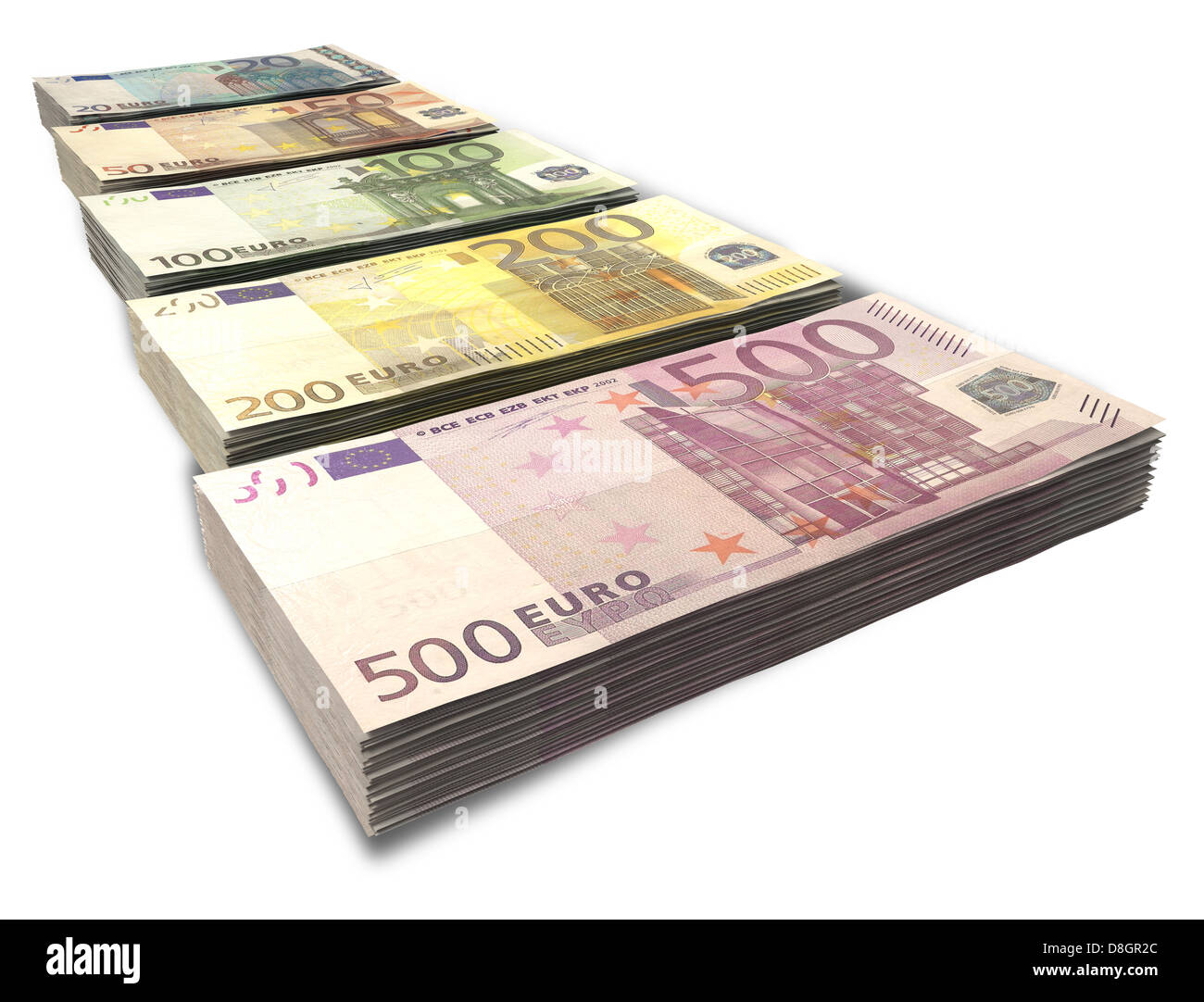 An assortment of euro note currency in stacks on an isolated background ...