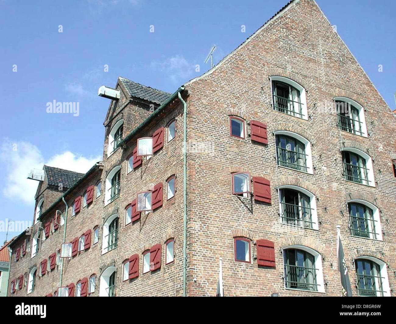 Old brick buildings show their historic charm, with weathered bricks ...