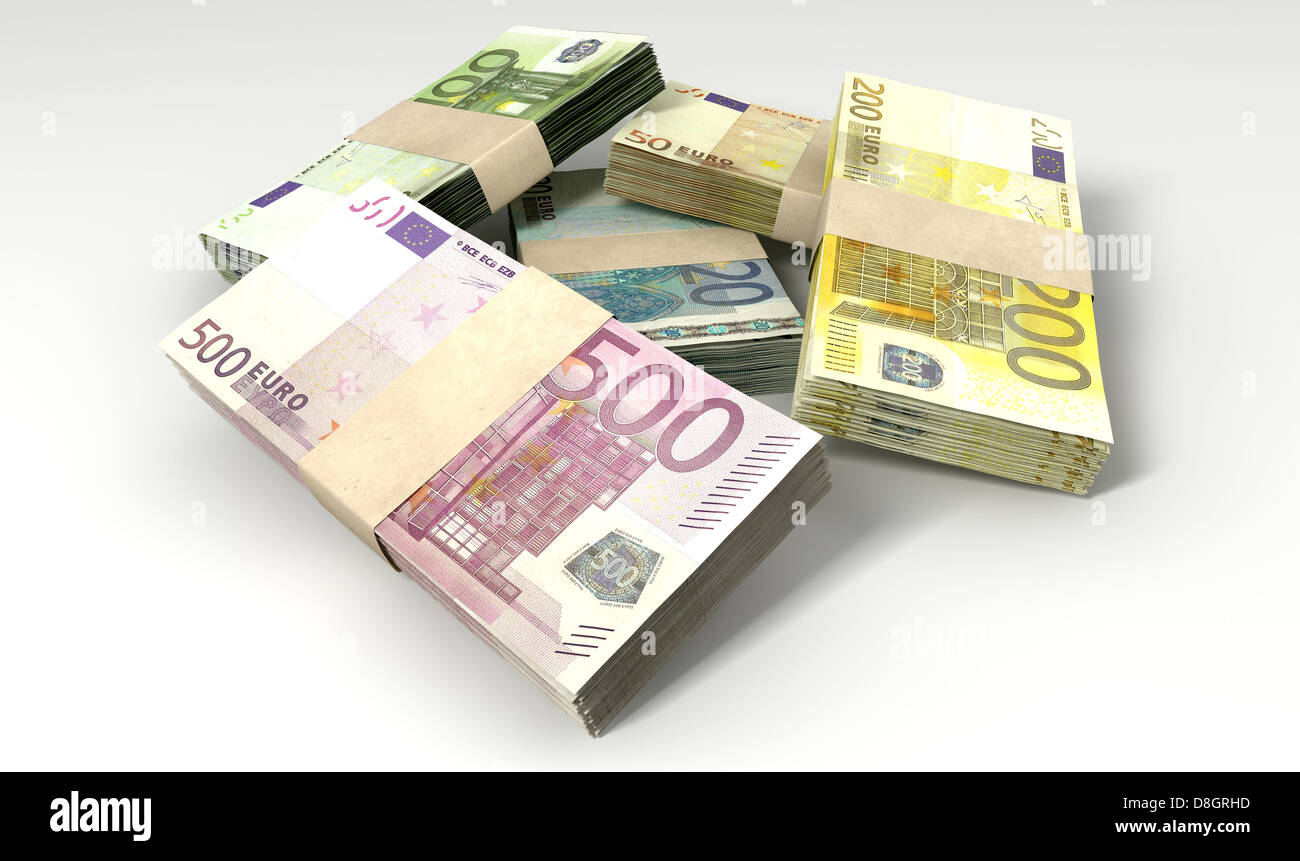 An assortment of euro note currency in scattered stacks on an isolated ...