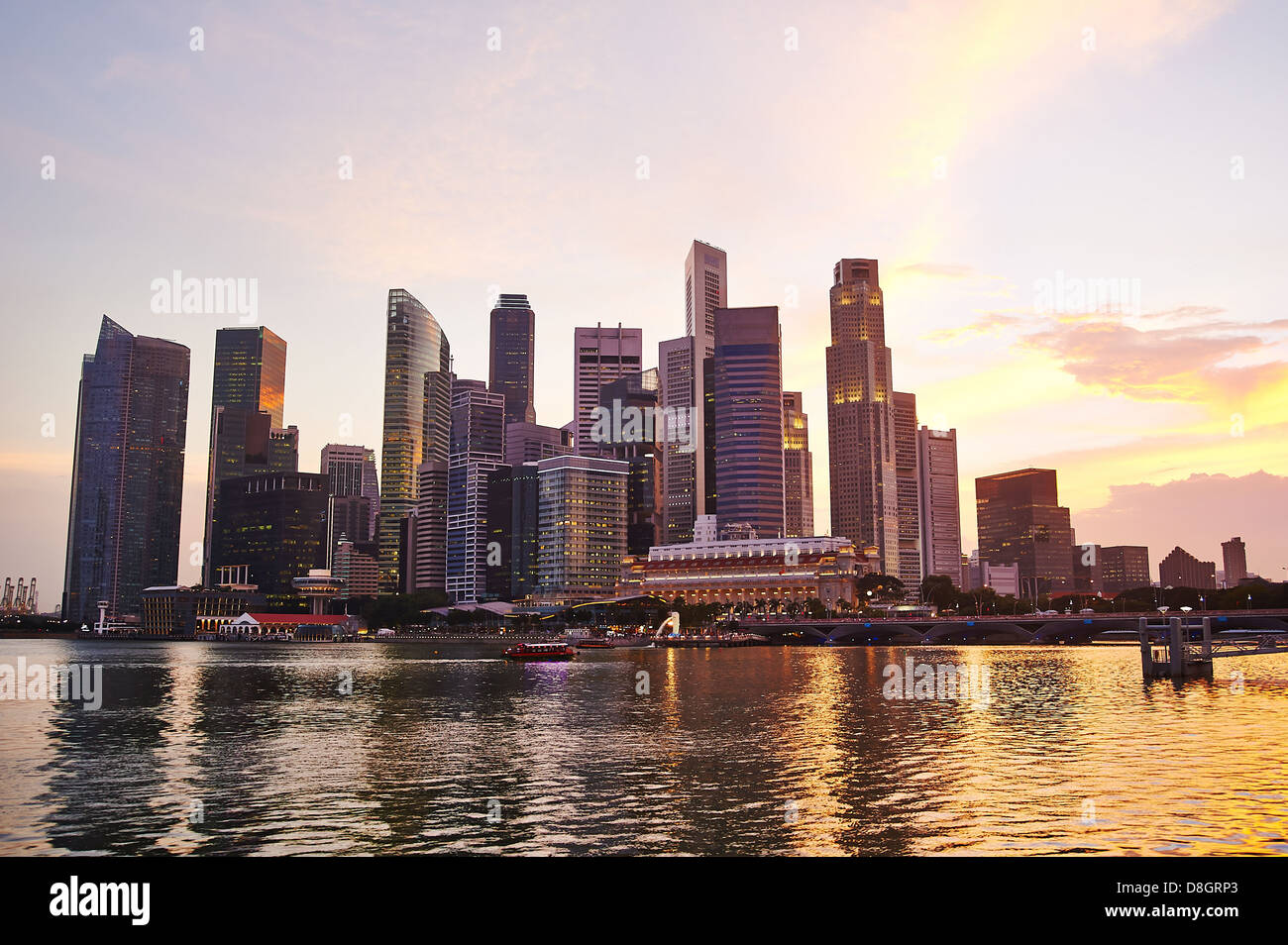 Colorful Singapore downtown at sunset Stock Photo - Alamy