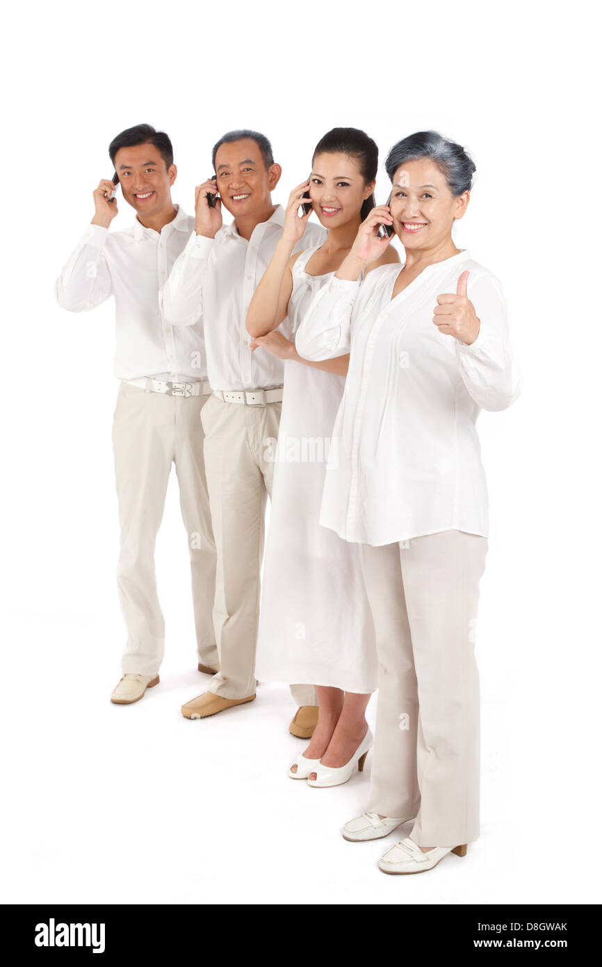Young couple and old couple making phone call Stock Photo - Alamy