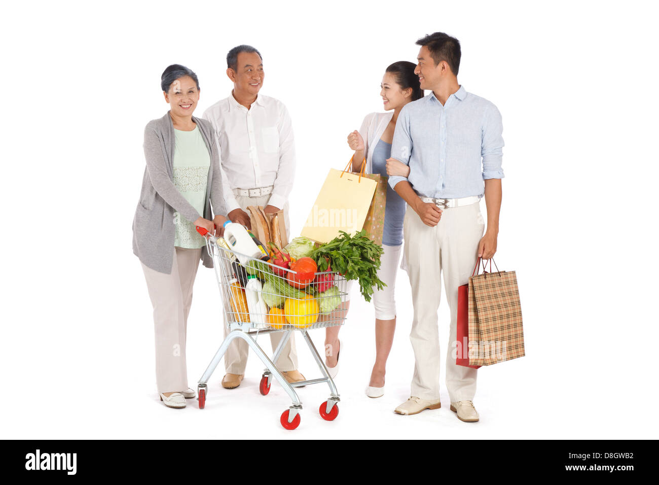 Senior man pushing young Cut Out Stock Images & Pictures - Alamy