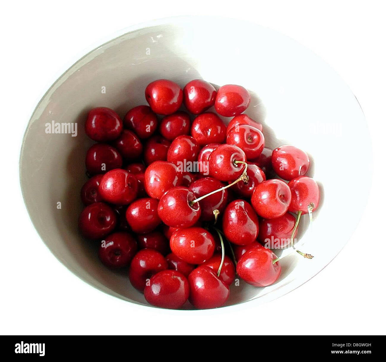 A close-up image of ripe cherries, showcasing their bright red color ...