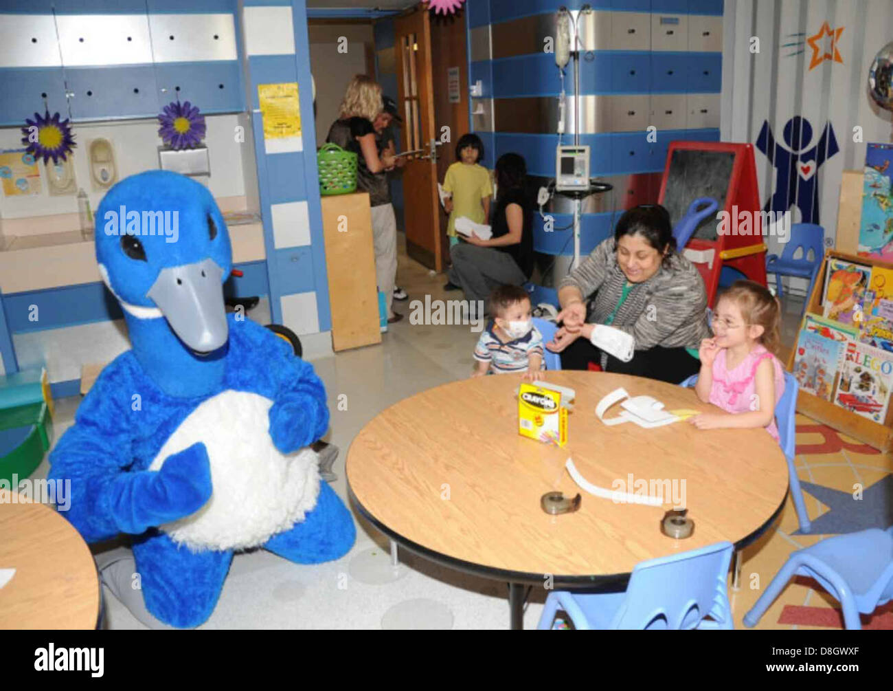 A group of young children play together in a kindergarten classroom ...