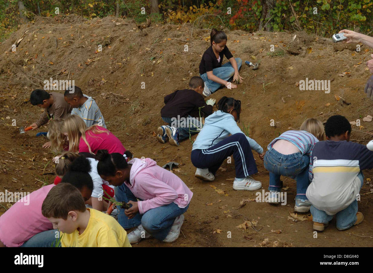 Children playing in ground Stock Photo - Alamy