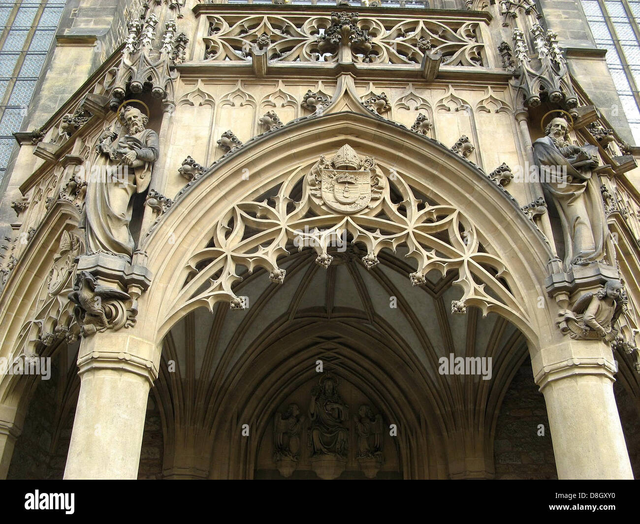 The entry of a church, typically characterized by its grand doors ...