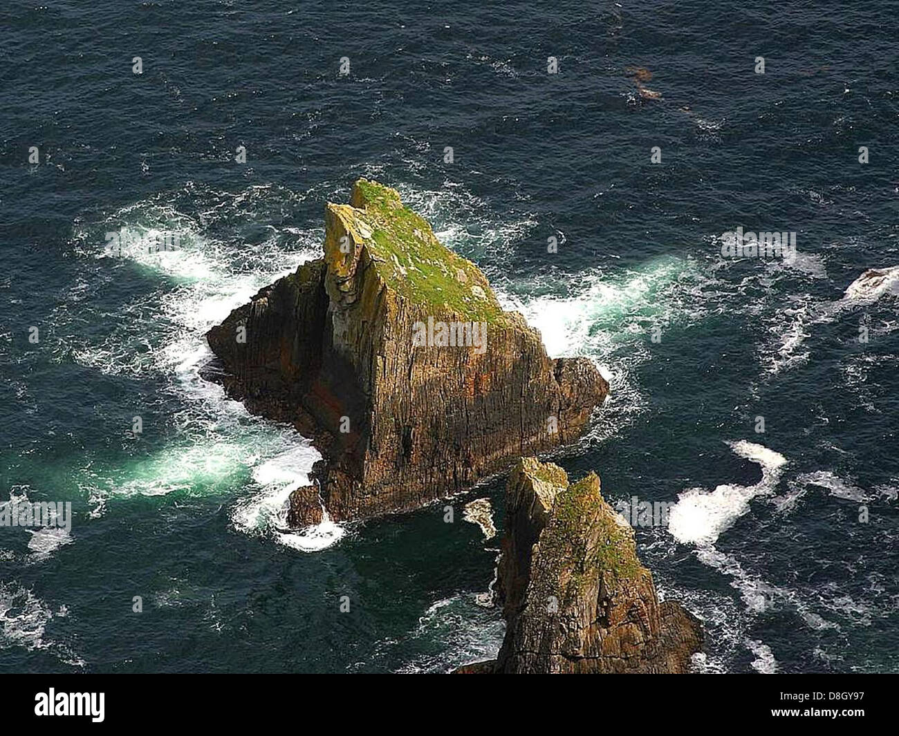 A breathtaking view of a cliffside landscape, with steep rock faces ...