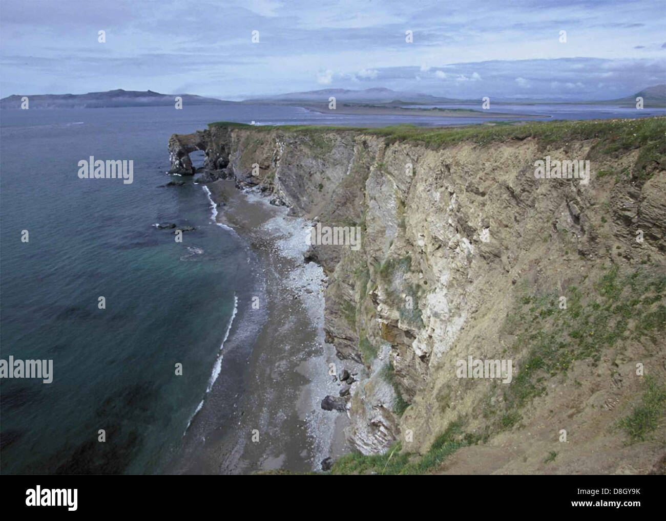 A dramatic view of cliffs along the ocean coast, highlighting the ...