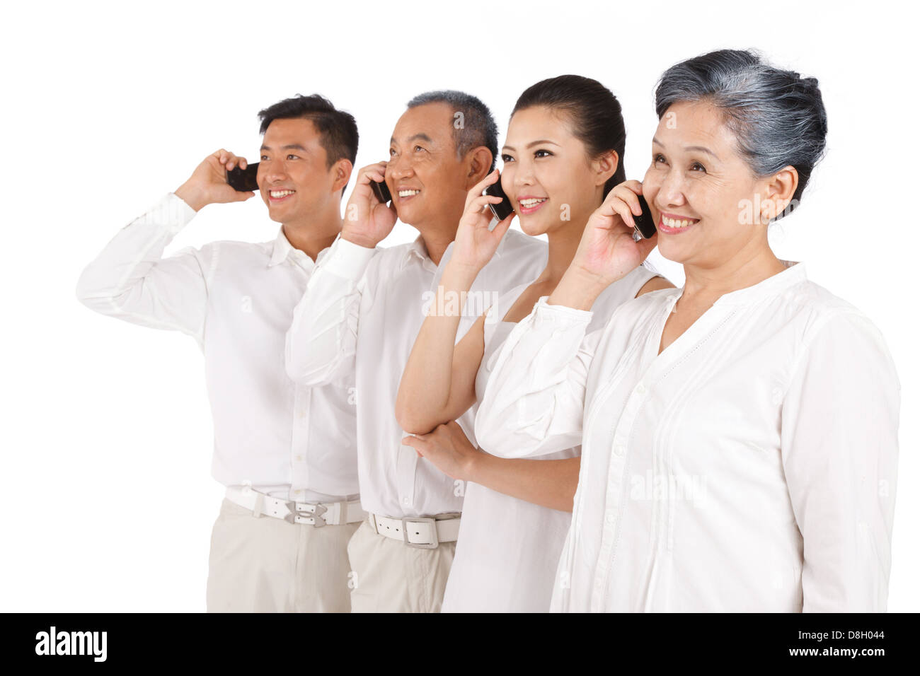 Young couple and old couple making phone call Stock Photo - Alamy
