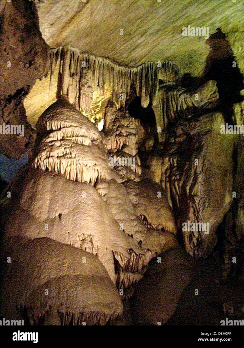 A crystal cave is shown, with natural formations of crystals adorning ...