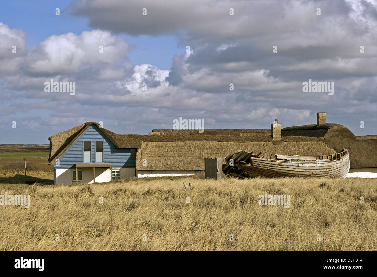 Farm with boat hull Stock Photo - Alamy