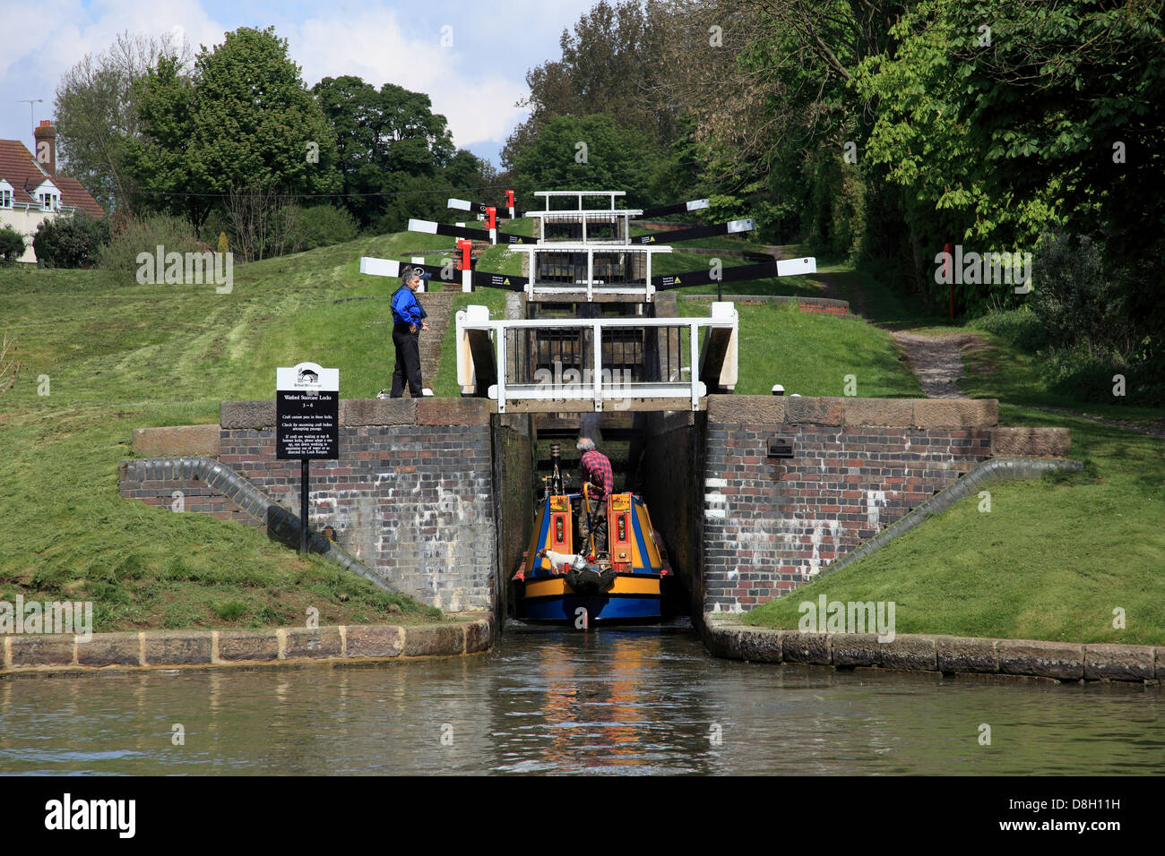 A narrowboat entering Lock 3, the bottom lock of the flight of Watford ...