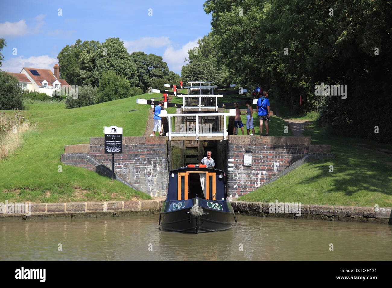 A narrowboat leaving Lock 3, the bottom lock of the flight of Watford ...