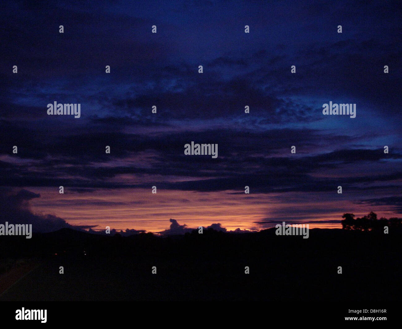 A scene depicting a dark, moonless night sky, with minimal lighting ...