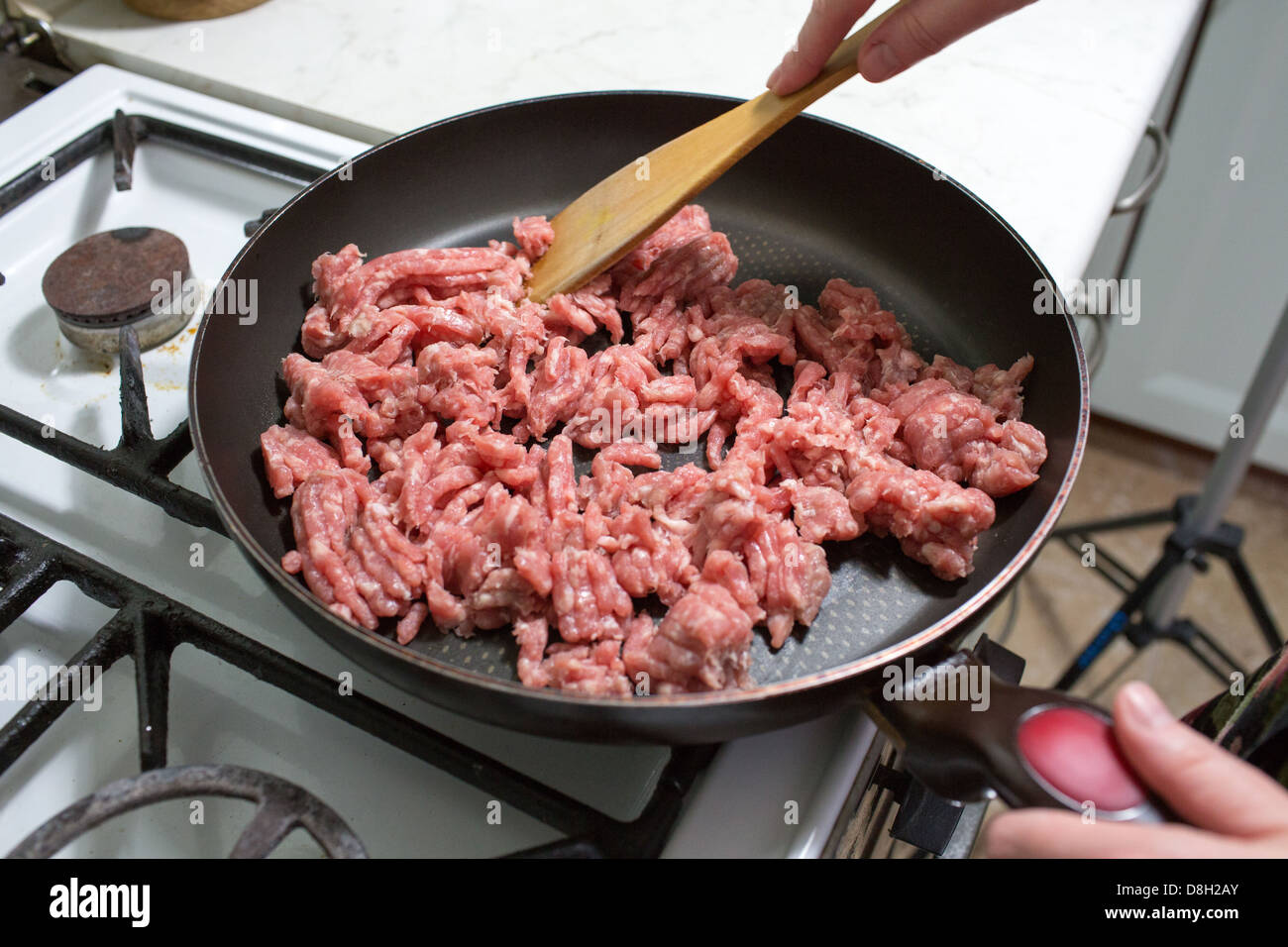 Minced meat on frying pan Stock Photo - Alamy