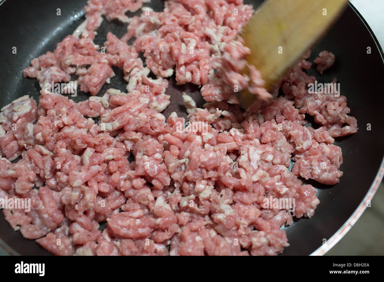 Minced meat on frying pan Stock Photo - Alamy