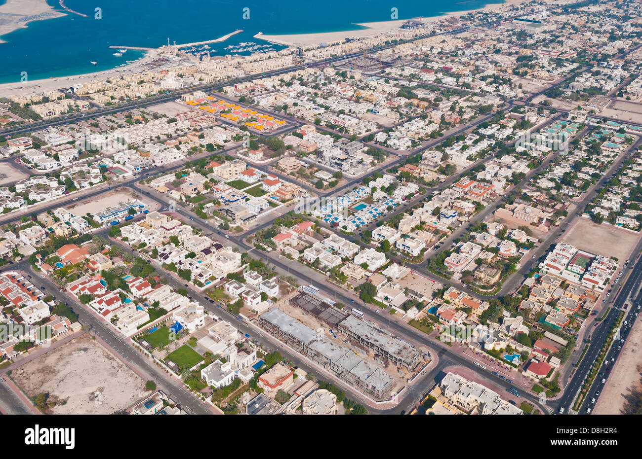 Aerial of Dubai in UAE of neighborhood homes off of downtown in United ...