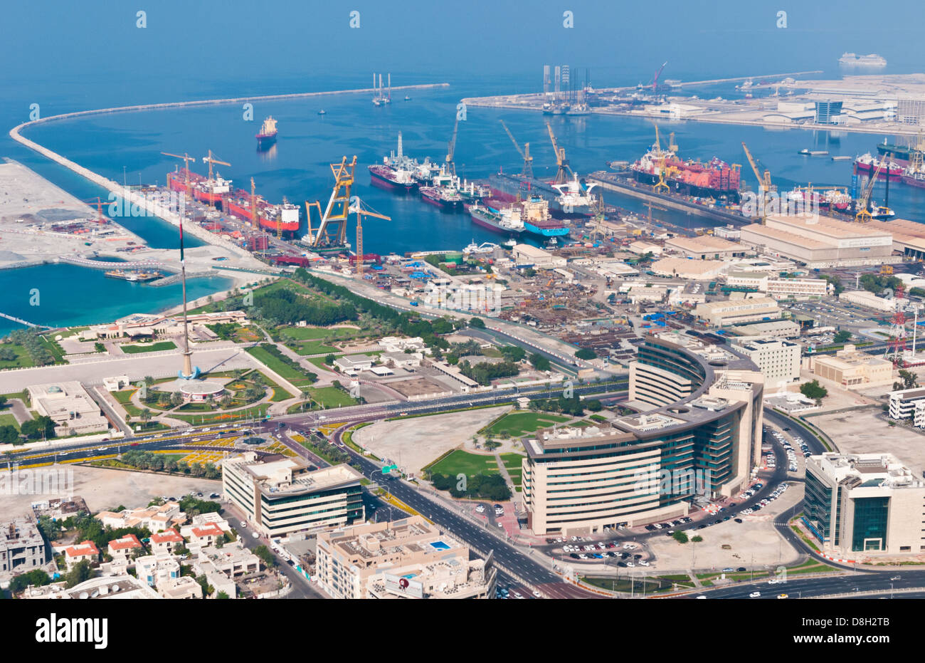 Aerial of Dubai in UAE of thriving dry docks shipping port off of ...