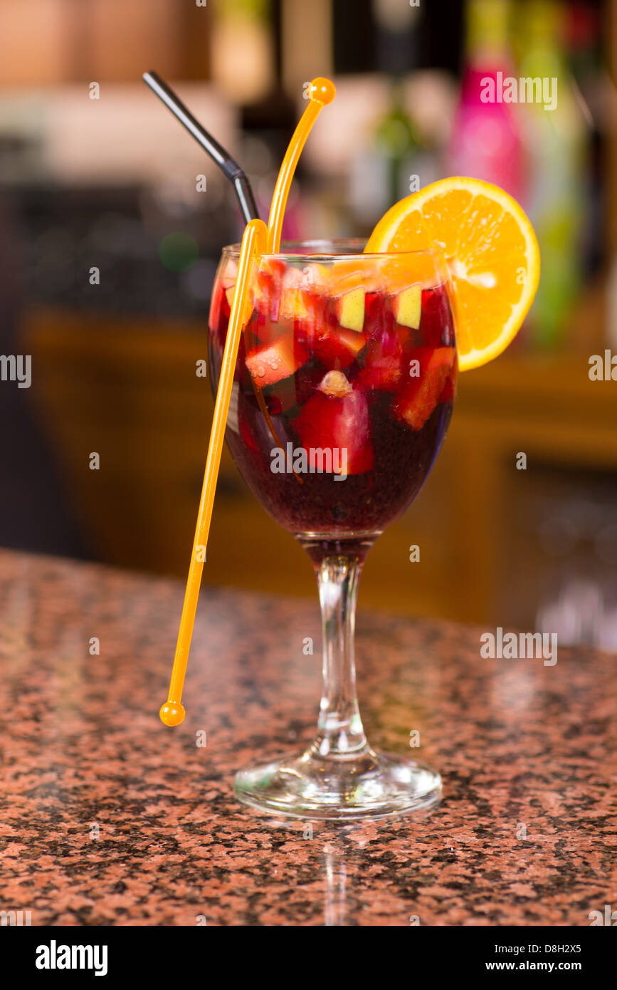 Glass of sangria on a bar counter Stock Photo - Alamy