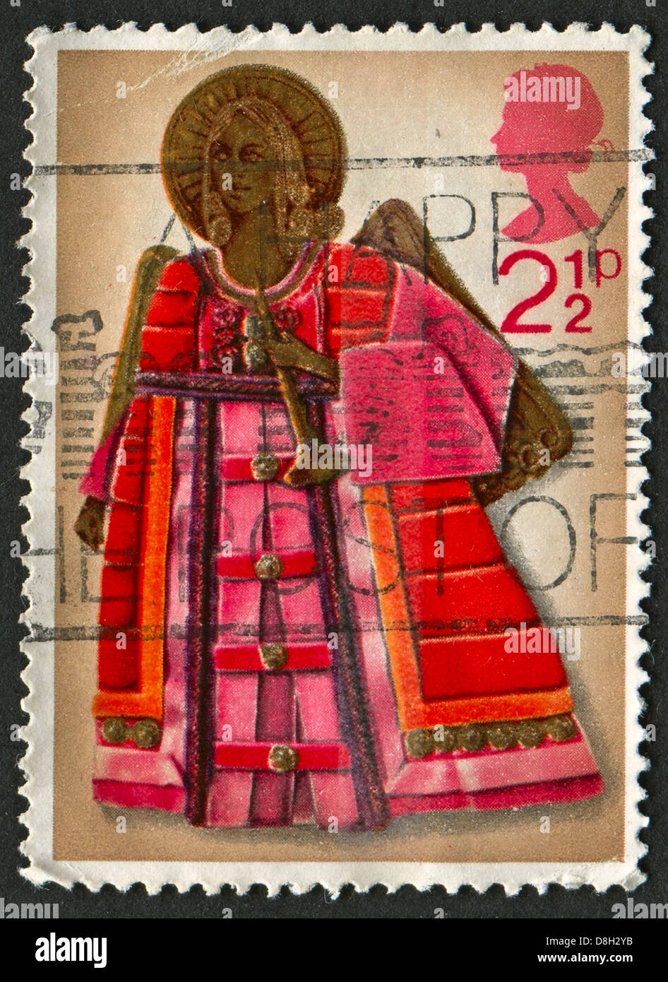 UK - CIRCA 1972: A stamp printed in UK shows image of the Angel holding ...