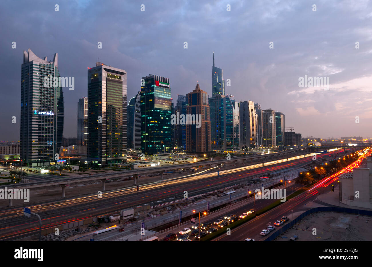 Skyline at sunset in amazing Dubai in the UAE with skyscrapers and ...