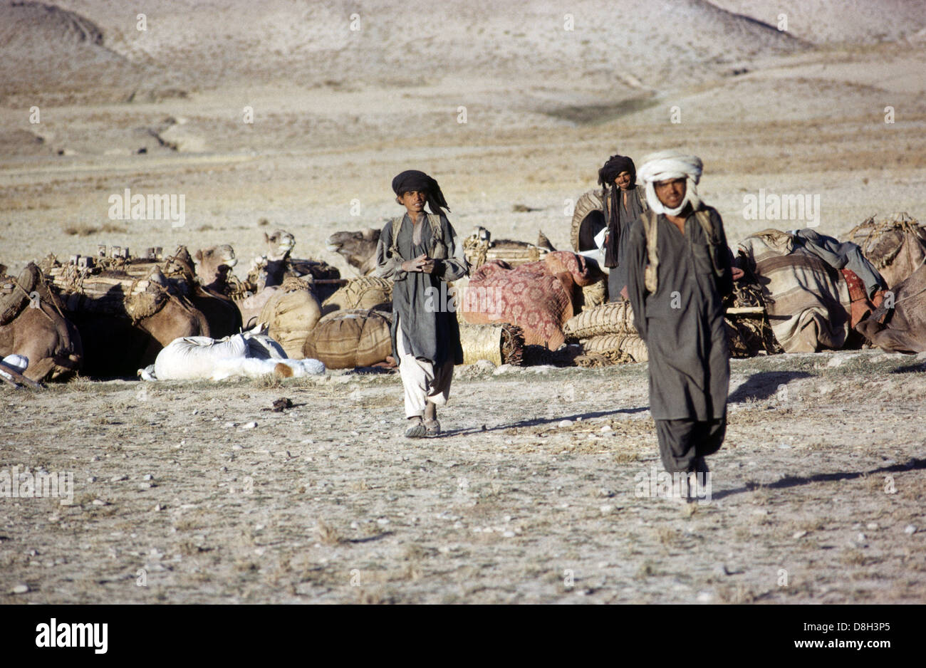 nomadic men in Afghanistan desert Stock Photo - Alamy
