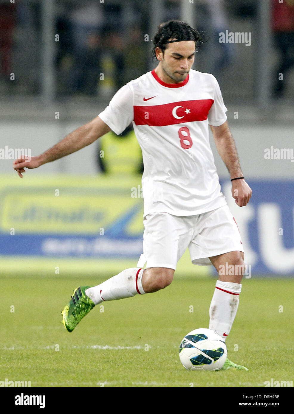 Turkey's Selcuk Inan plays the ball during the friendly match between ...